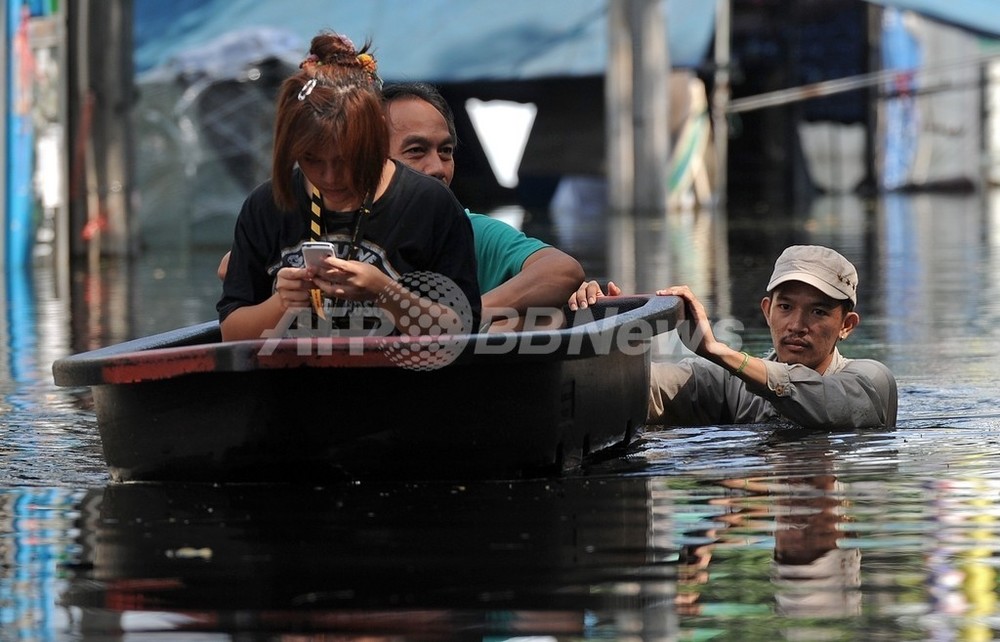 洪水被害のタイ国民、情報求めSNSに殺到 写真1枚 国際ニュース：AFPBB News