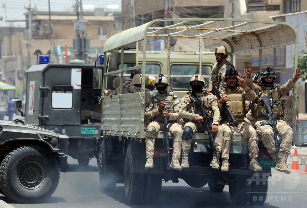 受刑者移送中のバスを武装集団が襲撃、60人死亡 イラク 写真1枚 国際ニュース:afpbb News