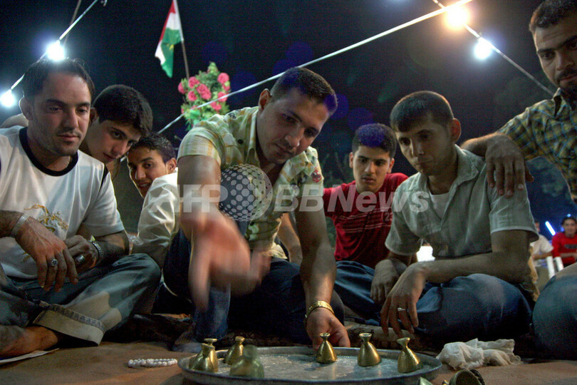 ラマダン期間中のクルド人の遊び、Mheibes 写真2枚 国際ニュース：AFPBB News